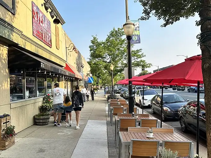 Sidewalk dining at Steak + Vine offers the perfect vantage point for people-watching while savoring a perfectly seared ribeye.