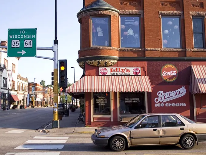Lilly's Café sits on the corner like a welcoming old friend, promising comfort food that makes calorie-counting seem like a crime against happiness.