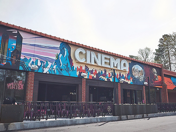 The neon glow of Video Vortex beckons film buffs and foodies alike. Part restaurant, part movie lover's paradise.