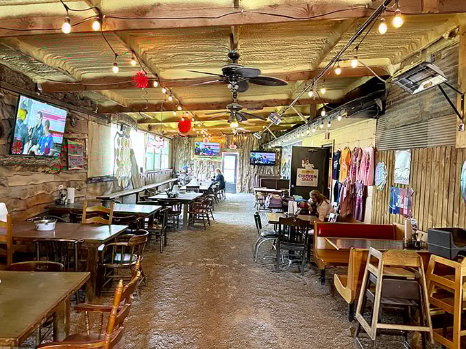 String lights and wooden beams create the perfect backdrop for chicken-induced euphoria. This isn't ambiance by design—it's authenticity by default.