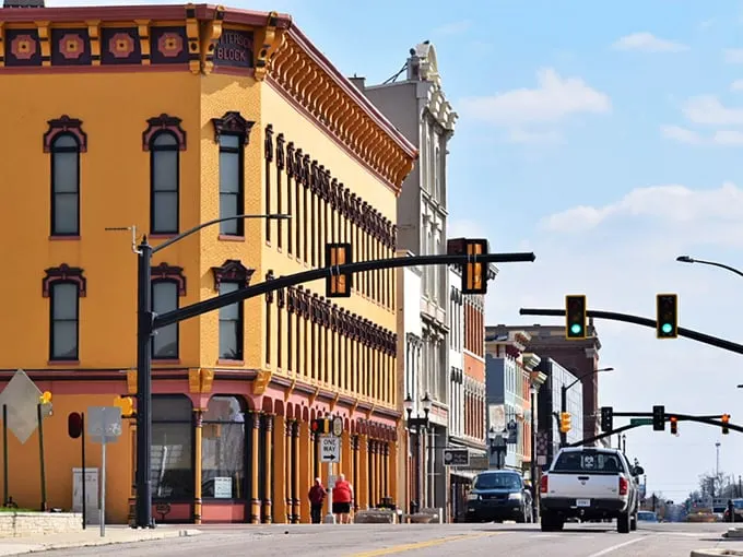 Historic buildings stand like colorful sentinels of the past, their ornate facades telling stories of Muncie's industrial heyday when glass and steel built fortunes.