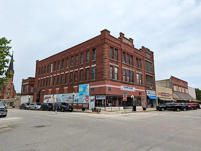 Red brick buildings stand like guardians of small-town America, where time moves at a pace that lets you actually taste your coffee while it's still hot.