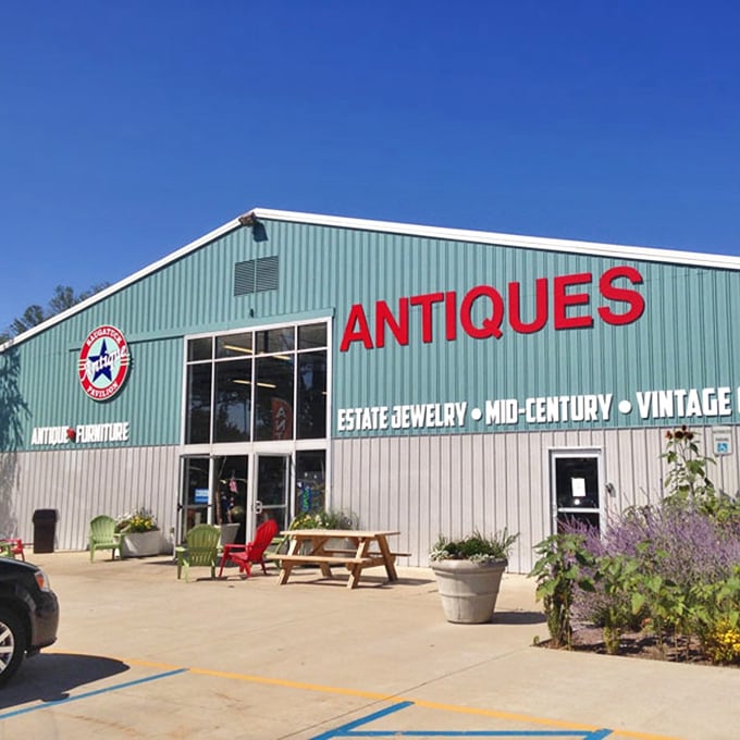 Welcome committee: Adirondack chairs and blooming planters invite you to catch your breath before diving into the wonderland of vintage finds.