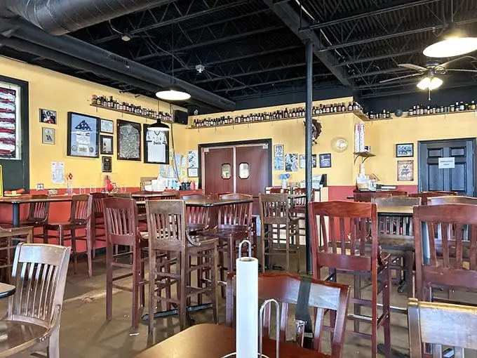 High ceilings, wooden chairs, and walls adorned with accolades – Pappy's dining room is where barbecue dreams come true, not fancy, just focused.