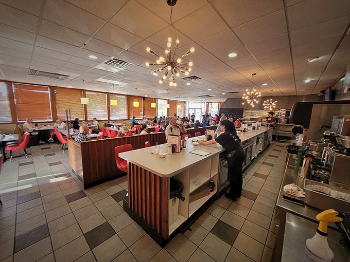 The bustling interior hums with the symphony of forks against plates and coffee cups clinking – breakfast theater at its finest.
