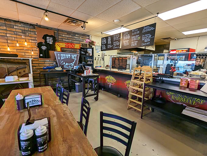 Step inside and the barbecue gospel reveals itself—chalkboard menus, wooden tables, and that intoxicating aroma that makes vegetarians question their life choices.