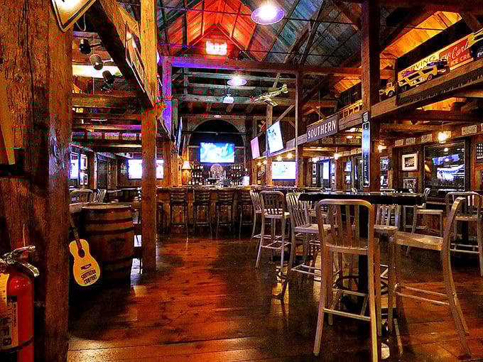 Rustic wooden beams, vintage memorabilia, and the promise of smoky delights—this interior says "serious barbecue happens here."