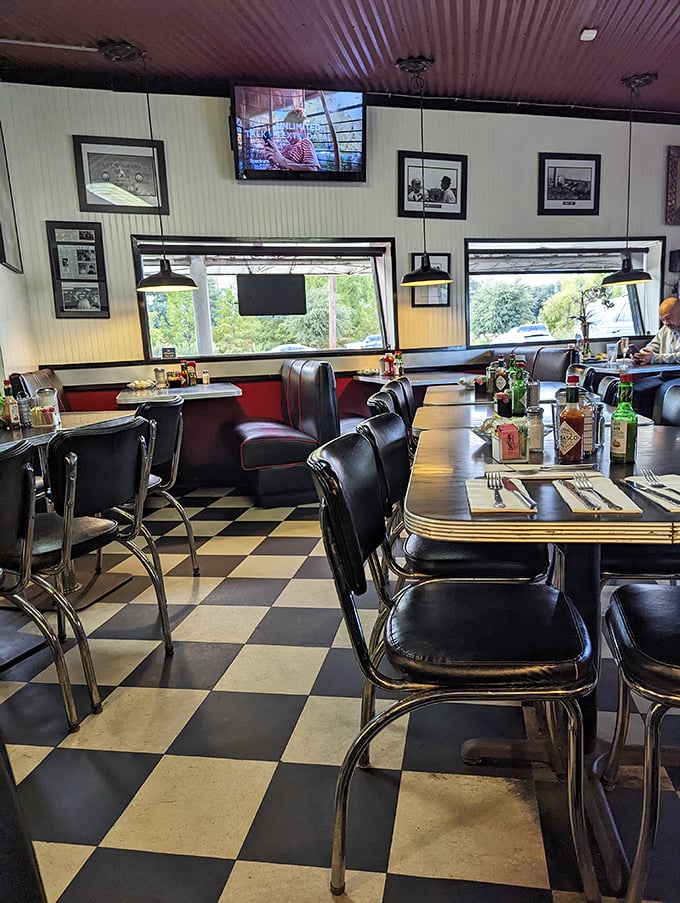 That classic black and white checkered floor isn't trying to be retro-cool—it's the real deal that's witnessed countless coffee refills.