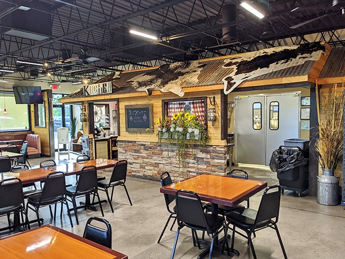 Rustic wooden elements and stone accents create the perfect backdrop for comfort food indulgence. No pretension here—just an honest space for serious eating.