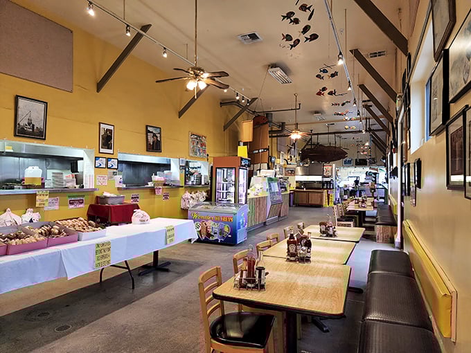 Sunshine-yellow walls and hanging fish create the perfect backdrop for seafood adventures. This isn't designer-curated ambiance—it's authentic maritime charm that's marinated for decades.