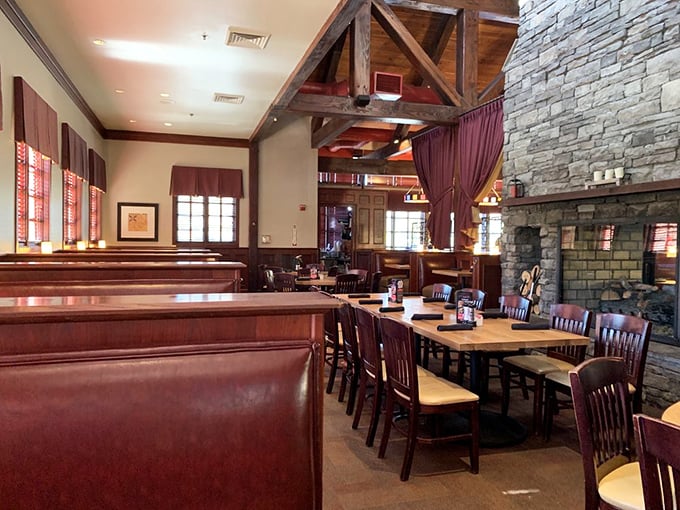 Lodge meets luxury in this dining room where wooden beams and stone fireplaces create the perfect backdrop for prime rib revelations. Somewhere Hemingway is nodding in approval.