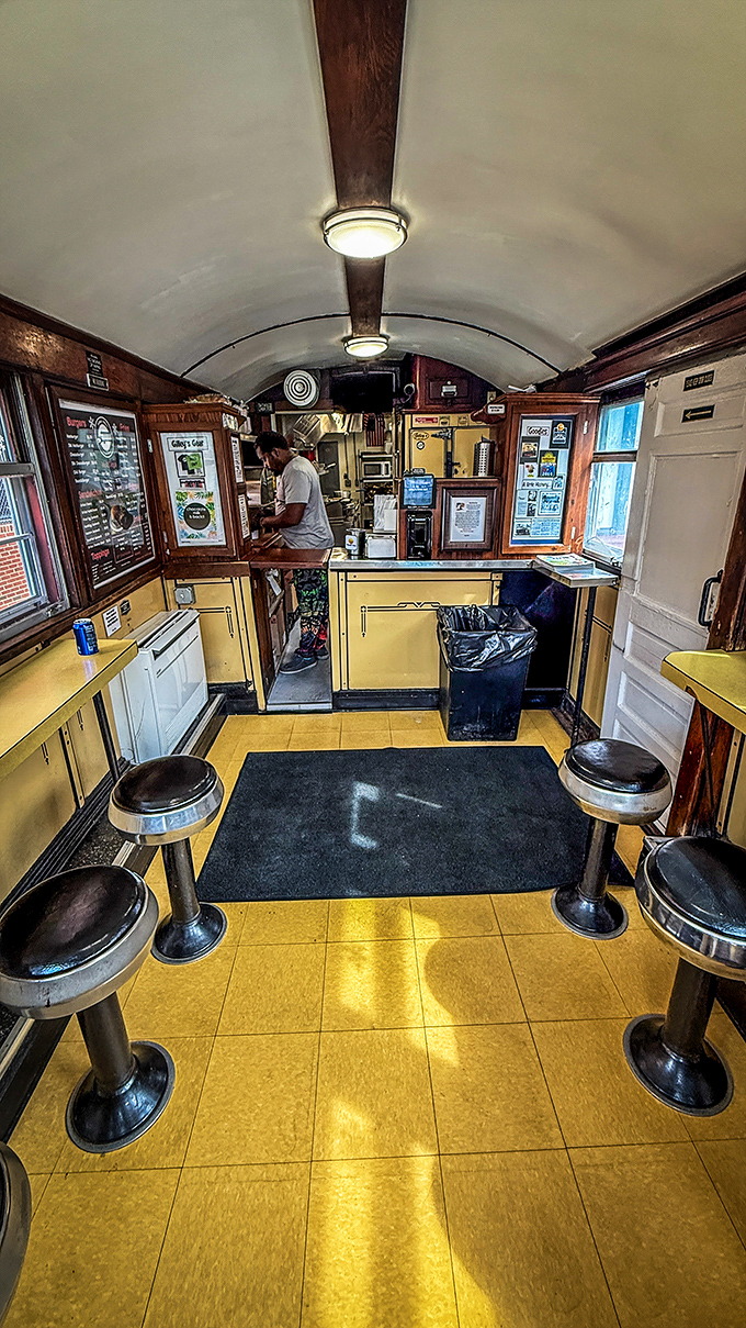 Step inside and you're transported to diner heaven—curved ceiling, classic counter stools, and just enough elbow room to navigate your burger to mouth.