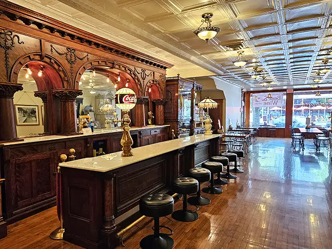 Gleaming marble counters meet masterful woodwork in this Victorian dream. It's not just a place to eat ice cream – it's where memories are scooped by the spoonful.