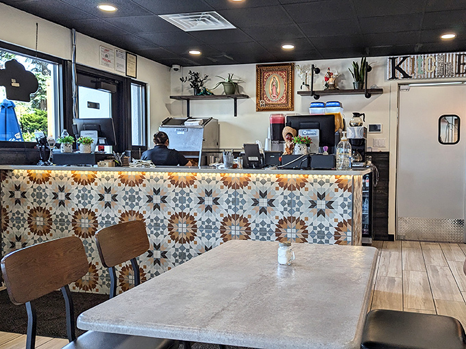 That gorgeous patterned tile counter isn't just Instagram-worthy—it's the gateway to flavor paradise. The Virgin Mary watches approvingly from above.