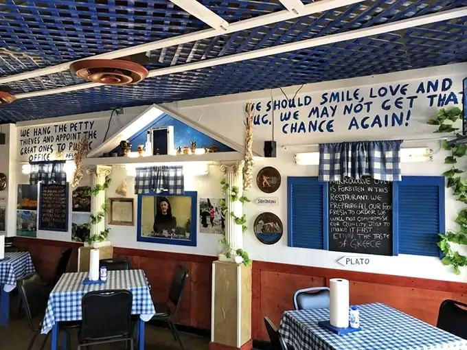 Philosophy on the walls, blue skies on the ceiling. This isn't just dining—it's a vacation for your soul while your stomach does the heavy lifting.