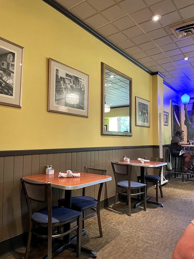 Yellow walls and vintage photos create that perfect "welcome home" vibe—the breakfast equivalent of a warm hug before your coffee even arrives.