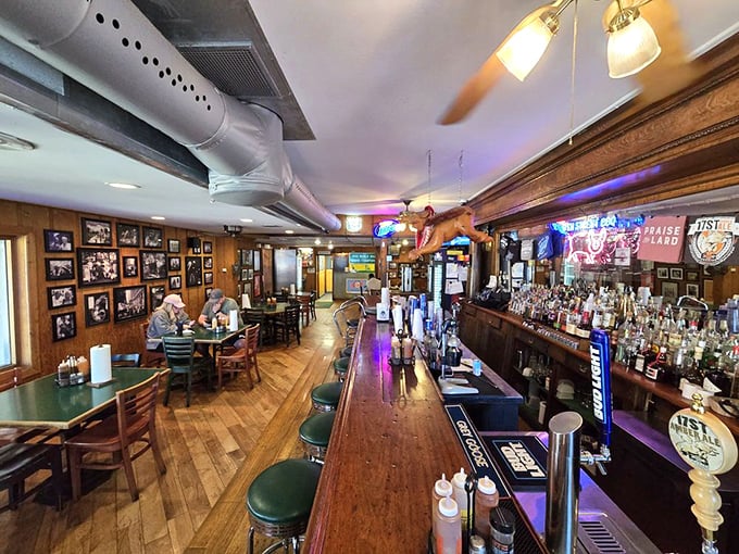 Where barbecue dreams and bourbon realities meet. This wood-paneled sanctuary has hosted more meat-induced euphoria than a Woodstock for carnivores.