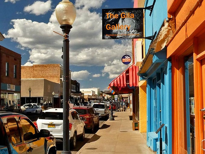 Bullard Street's vibrant facades pop against the New Mexico sky, where art galleries and local shops create a rainbow of southwestern hospitality.