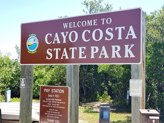 The most exclusive address in Florida doesn't have a mailbox. Just this humble sign, a $2 entry fee, and the promise of paradise beyond.