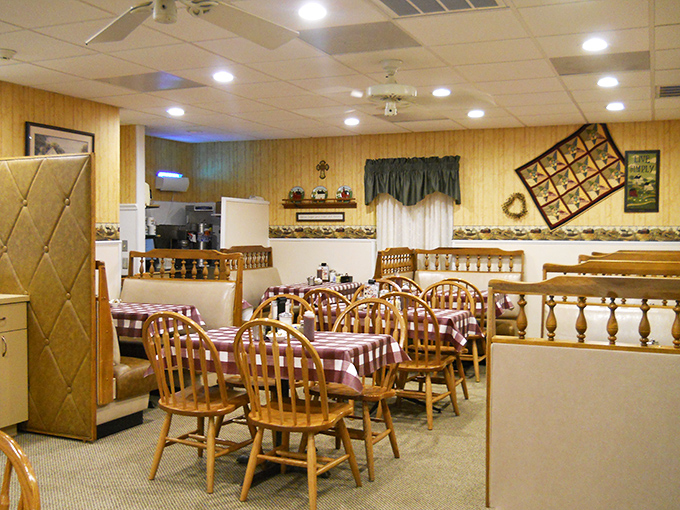 Wooden chairs, checkered tablecloths, and quilts on the wall – Yoder's interior feels like a warm hug from grandma, minus the cheek pinching.