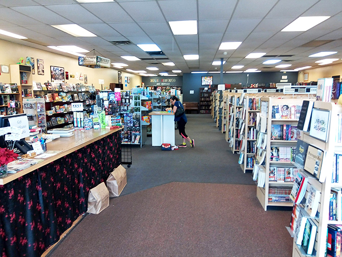 Walking through these aisles feels like entering a literary TARDIS—seemingly endless rows of books stretching far deeper than the outside suggests.