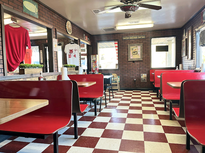Step into a Norman Rockwell painting come to life, where red vinyl booths and checkered floors tell you authenticity isn't manufactured – it's preserved.