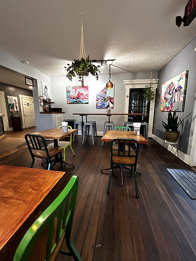Inside, mismatched chairs and vibrant local art create the perfect backdrop for morning conversations. This isn't decoration—it's personality on display.
