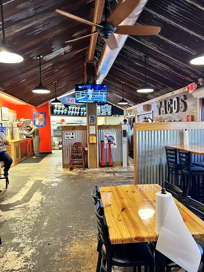 Rustic wooden beams, corrugated metal, and that giant "TACOS" sign – subtle hints that you're about to experience something far from ordinary.
