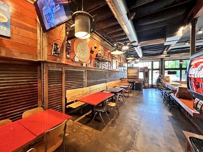 Step inside and the rustic-industrial vibe hits you—corrugated metal meets warm wood in a space that says "serious about chicken, not about pretension."
