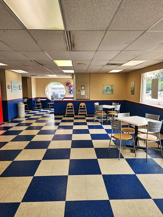 That blue and white checkered floor isn't just decoration—it's a time machine to simpler days when ice cream parlors were community gathering spots.