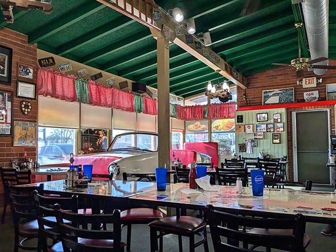 Where nostalgia meets appetite. The vintage car display inside Crazy Otto's isn't just decor—it's a reminder that some American classics never go out of style.