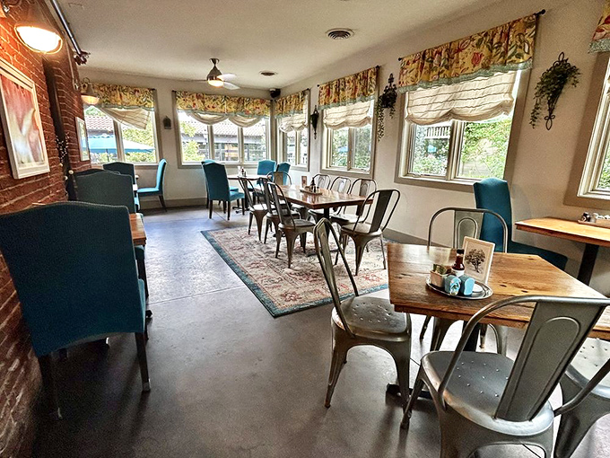 Exposed brick, teal banquettes, and natural light create the perfect breakfast sanctuary. Like dining in your coolest friend's lovingly renovated farmhouse.