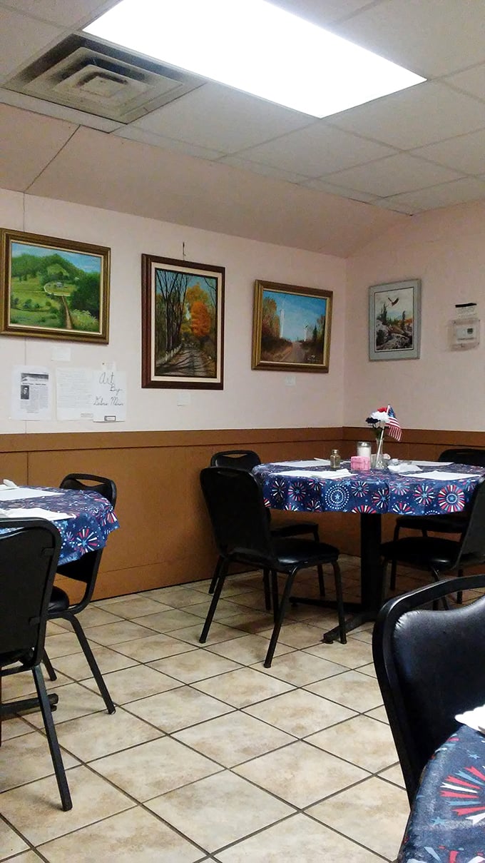 Simple tables, landscape paintings, and patriotic tablecloths – the dining room at Mom's Place feels like the West Virginia version of your grandmother's Sunday best.