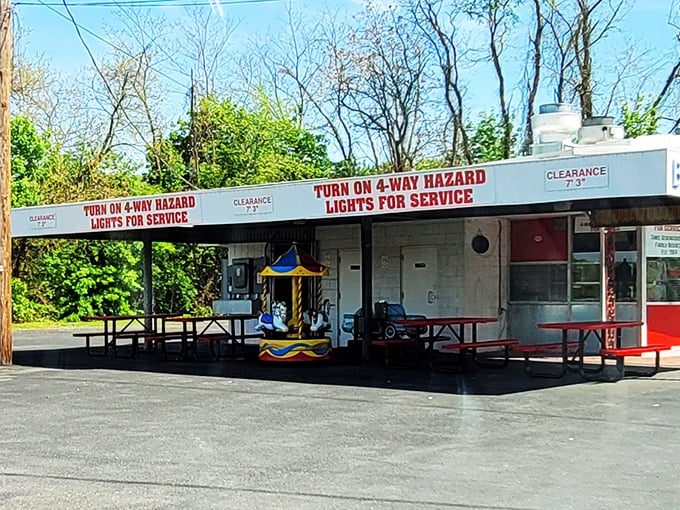 Car-side service that transports you back to simpler times. Flash your hazards, and like magic, dinner appears at your window—no smartphone app required. 
