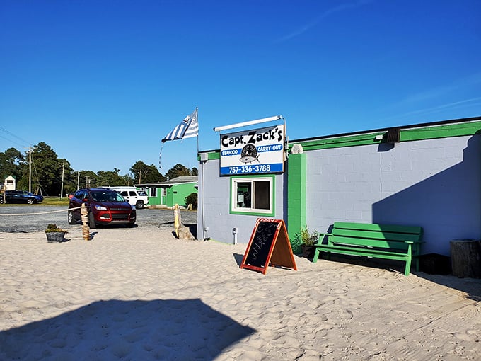 Captain Zack's tiny green seafood shack sits right on the sand—proof that greatness often comes in small, unassuming packages.