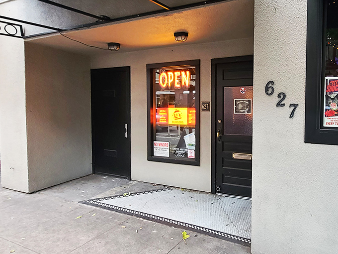 Creepy's neon sign glows like a beacon for the brave, promising cocktails with a side of delightful weirdness.