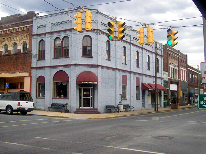 A corner building with character—where the traffic lights change slow enough to notice the architecture.