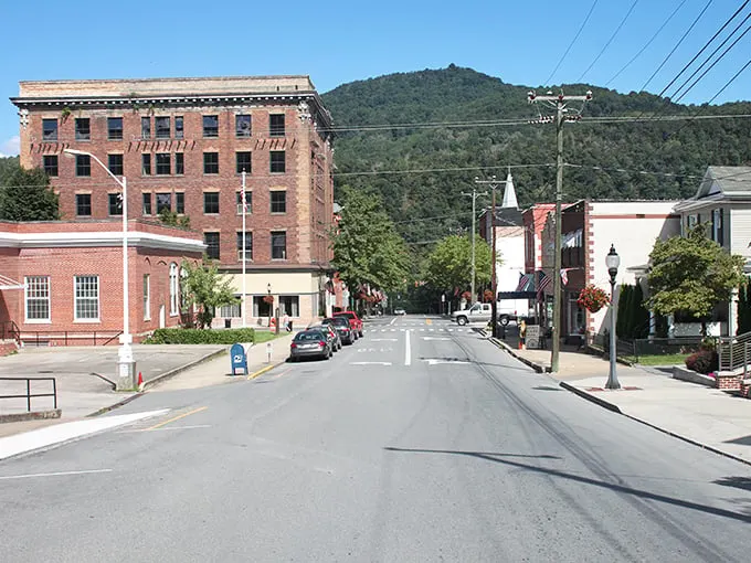 Hinton's historic downtown stands proudly against the mountains, where rent costs less than a fancy dinner in Manhattan.