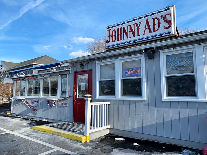 Johnny Ad's stands proud like a seafood lighthouse, guiding hungry travelers to shore with promises of perfectly fried clams.