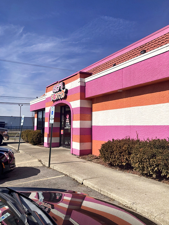 The pink and orange stripes of Amy's Donuts aren't just eye-catching—they're a warning sign that your diet is about to be gloriously derailed.