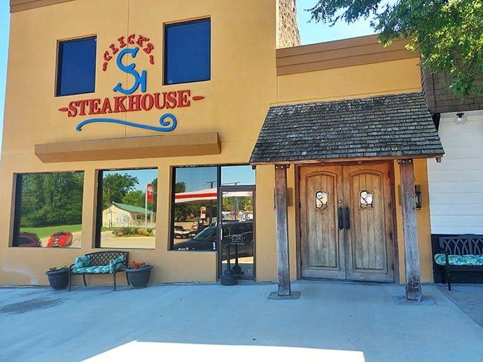 Those wooden doors aren't just an entrance—they're a portal to the kind of steak that makes vegetarians question their life choices.