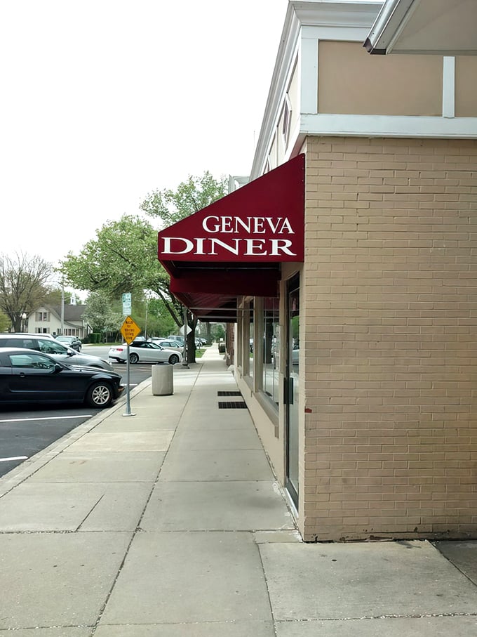 That bold red Geneva Diner sign beckons hungry travelers—your pancake paradise awaits just beyond those windows.