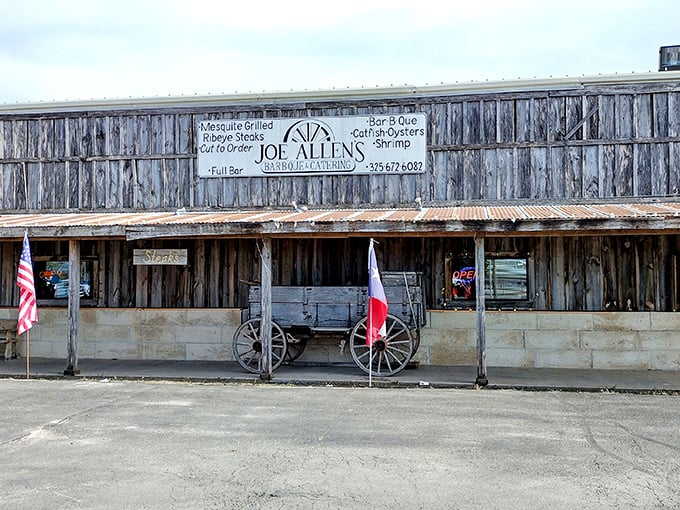 That antique wagon isn't just for show – it's carried generations of Texans to some of the best mesquite-grilled steaks around.