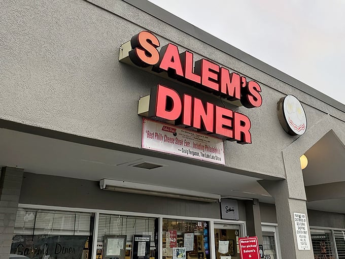 That iconic red sign at Salem's Diner has guided hungry Alabamians to biscuit nirvana for years—like a carb-loaded North Star.