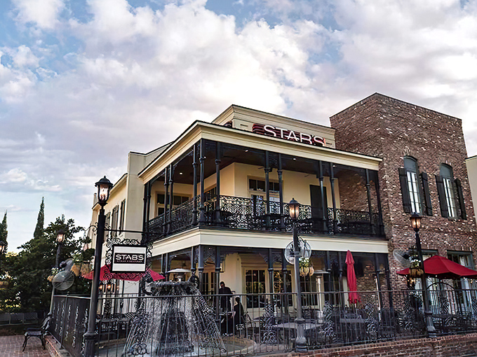 Evening at Stab's—where the fountain bubbles, the balcony beckons, and the steaks sizzle with Southern charm.