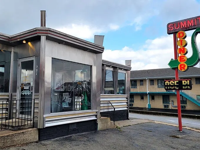 Summit Diner (side view): Classic stainless steel exterior that whispers, "Inside these walls, gravy is considered a beverage." Pure Americana on display.