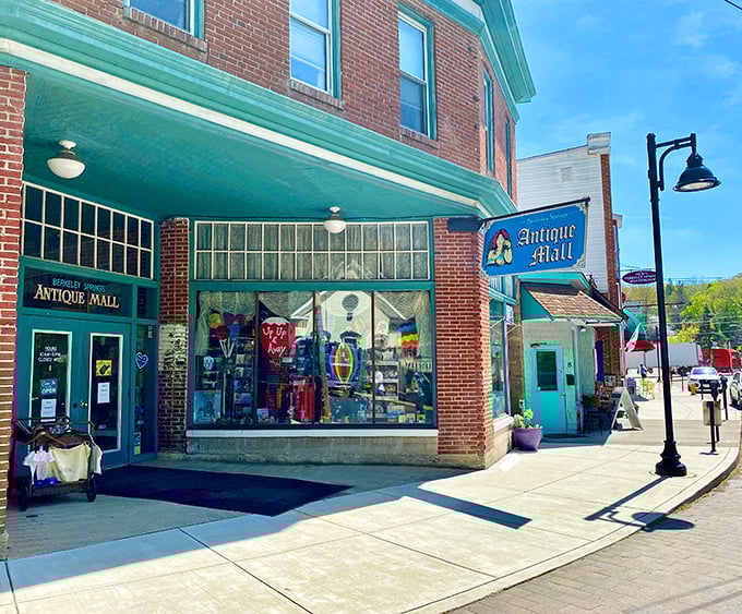 The Antique Mall promises treasure hunting at its finest, where yesterday's ordinary becomes today's conversation piece under that distinctive turquoise awning.