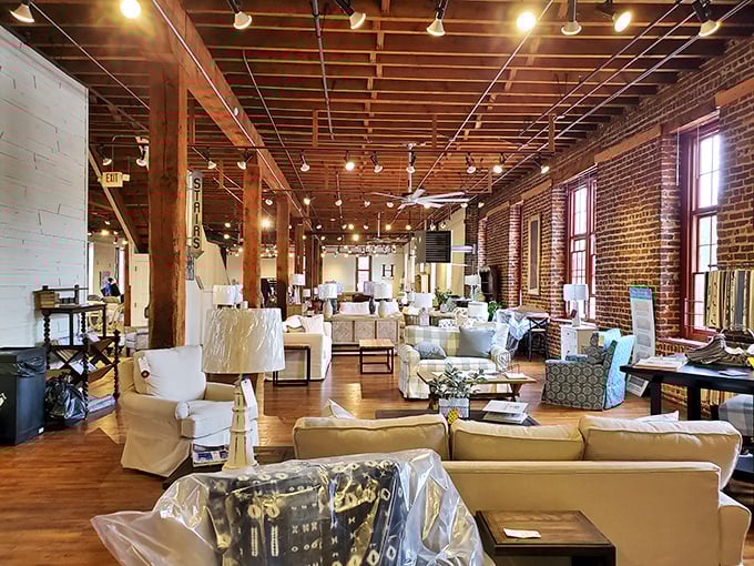 Exposed brick walls and wooden beams create the perfect backdrop for comfortable conversation areas that practically beg you to sit and stay awhile.