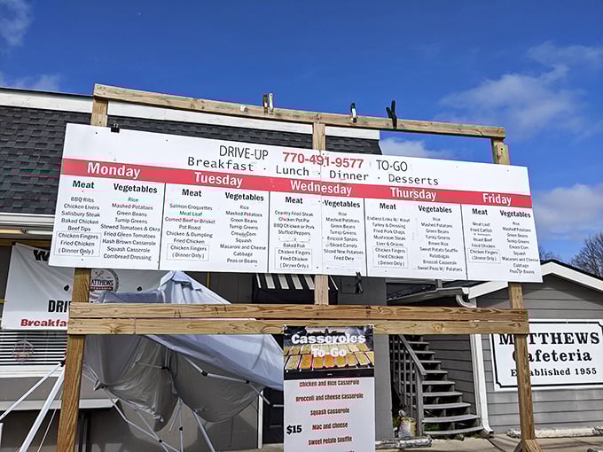This drive-up menu board isn't planning your meal – it's plotting your entire week's happiness with a rotating cast of Southern classics.