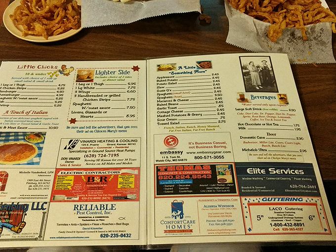 The menu doubles as local advertising real estate—where else can you contemplate chicken livers while shopping for a heating contractor?